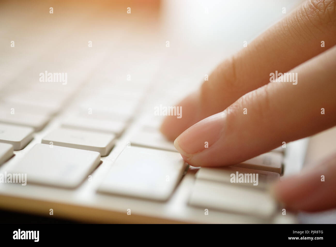 Macro shot fingers typing laptop hi-res stock photography and images ...