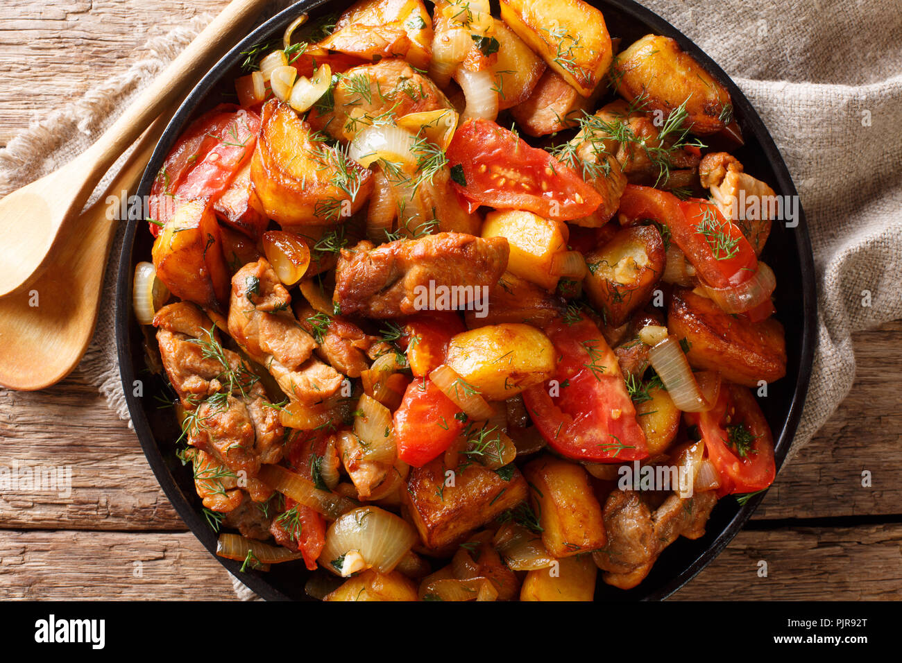 Georgian traditional recipe ojahuri with pork and potatoes close-up on ...