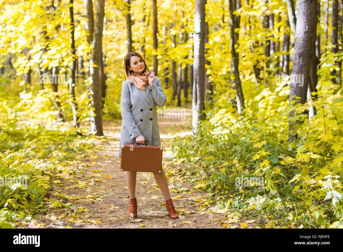 Season, fall and people concept - Portrait of a beautiful young woman ...