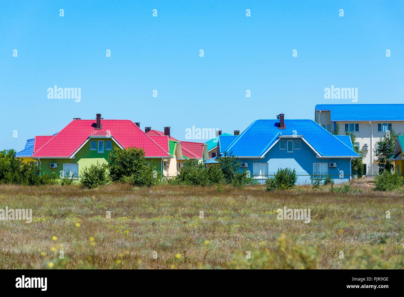 A section of colorful terraced housing in a west country seaside town ...