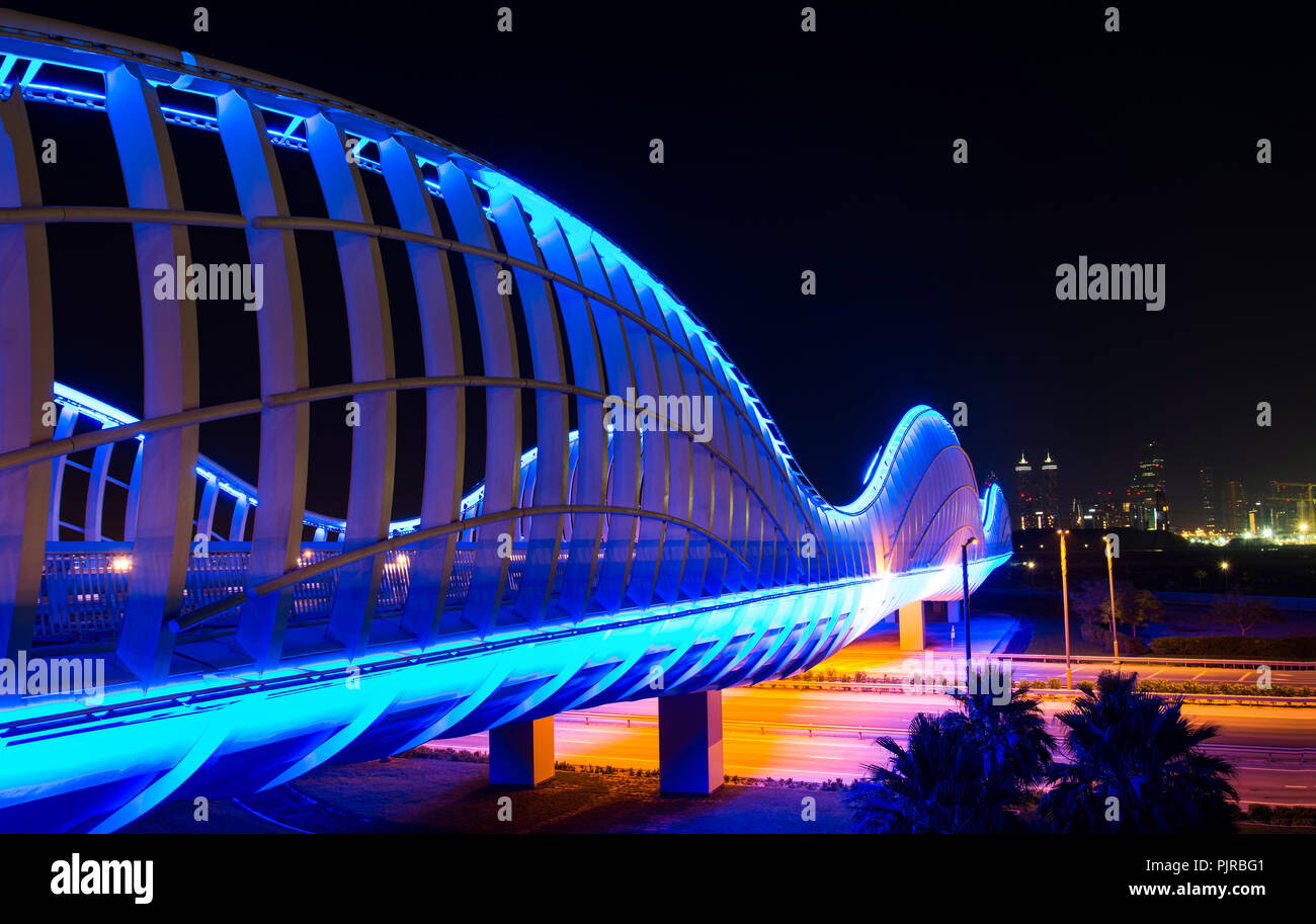 Modern Meydan bridge in Dubai at night Stock Photo - Alamy