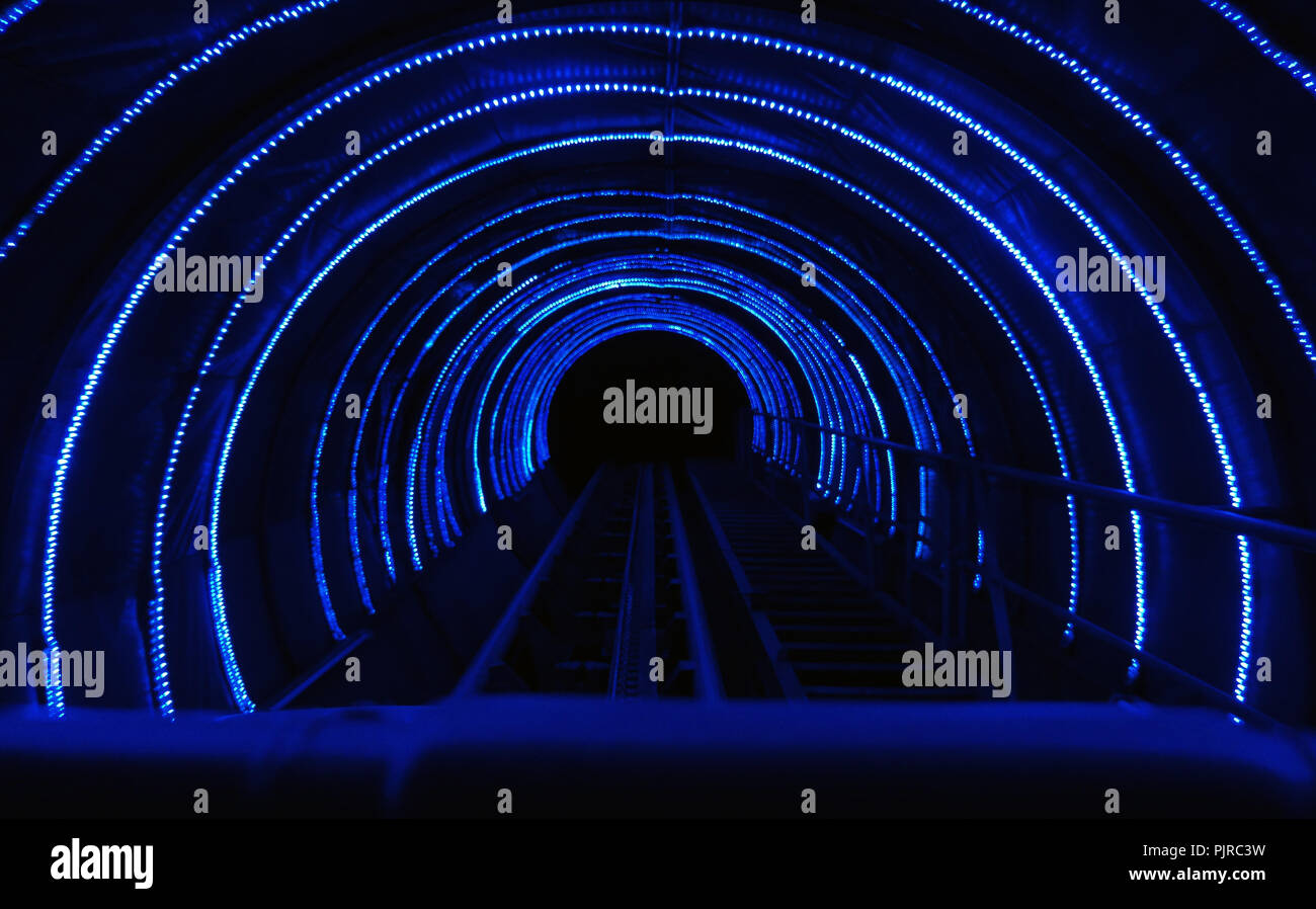 Dark tunnel with blue light lines in the form of an arch Stock Photo ...