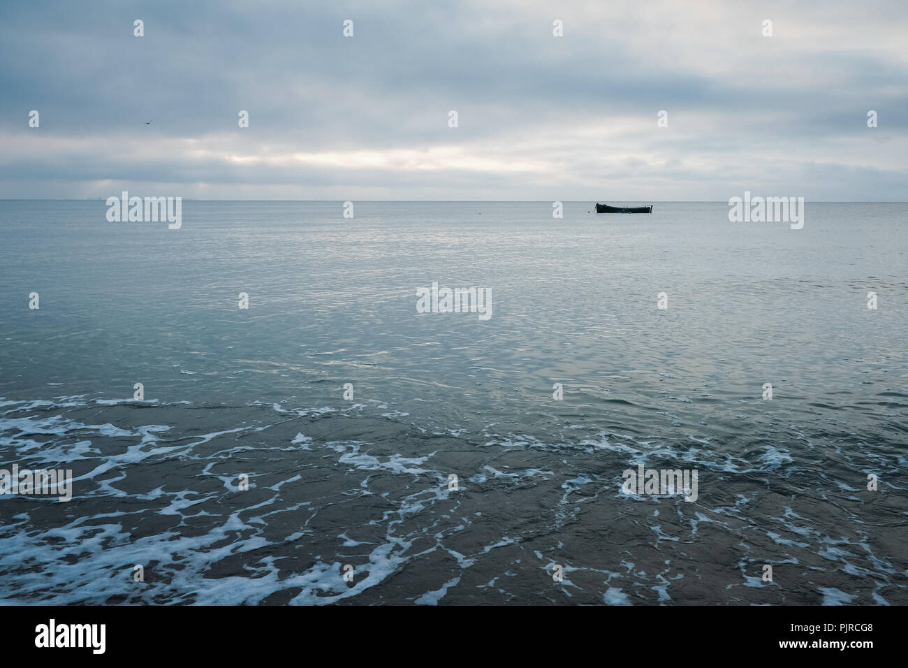 The boat sailed to the sea, far from the shore Stock Photo - Alamy