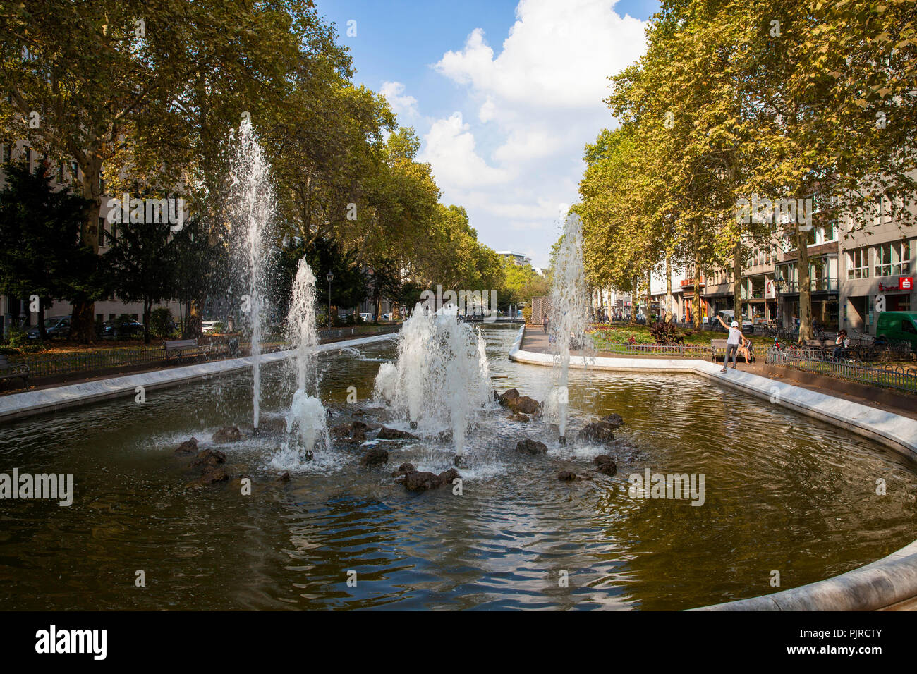 Germany, Cologne, fountains at the street Kaiser-Wilhem-Ring ...