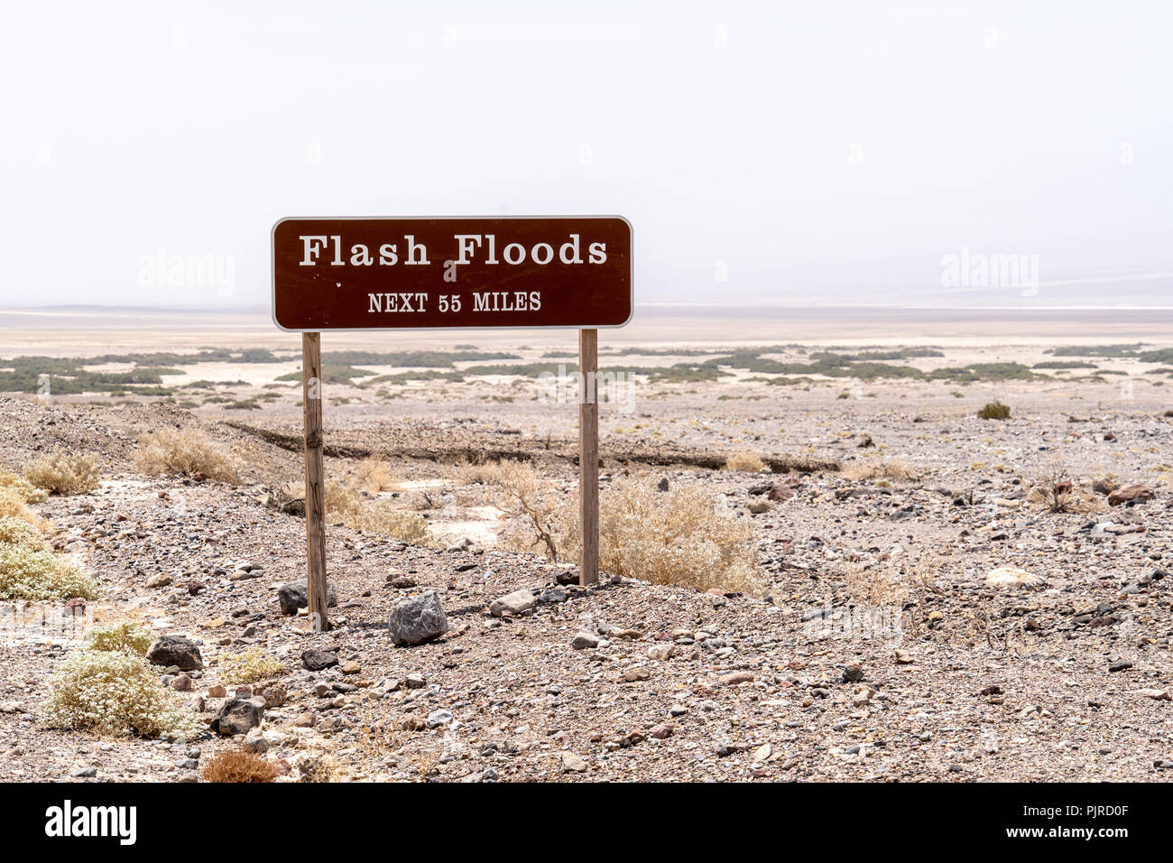 Flash floods warning sign warns motorists of potential dangerous ...