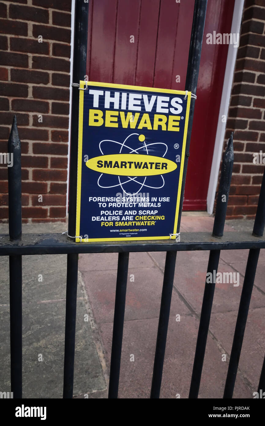 Smartwater issue of a 'Thieves beware' sign at a church hall in South ...