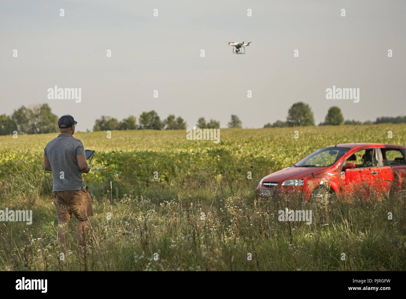 Man Manages Quadrocopters Remote Control For The Drone In The Hands Of
