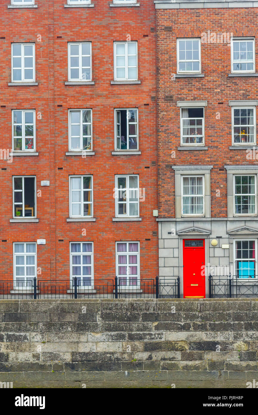Residential building in Dublin with red door, Ireland Stock Photo - Alamy