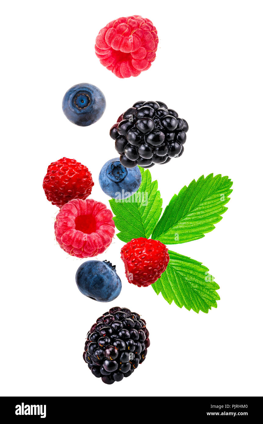 Falling berry mix isolated on a white background Stock Photo - Alamy