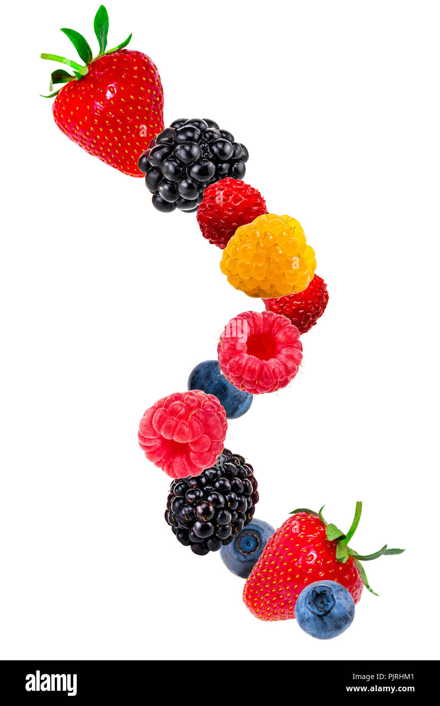 Falling berry mix isolated on a white background Stock Photo - Alamy