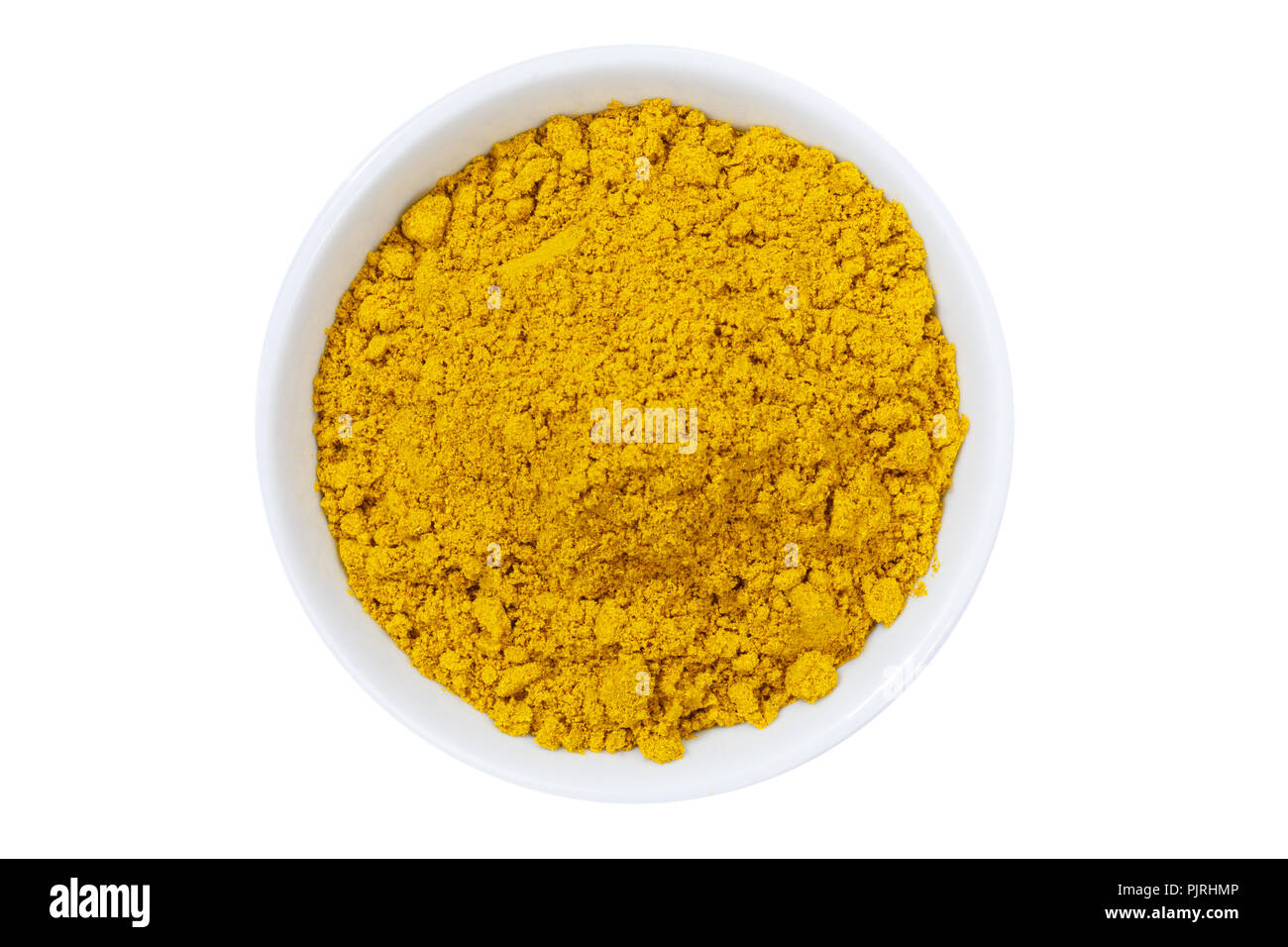 Curry powder spice from above bowl isolated on a white background Stock ...