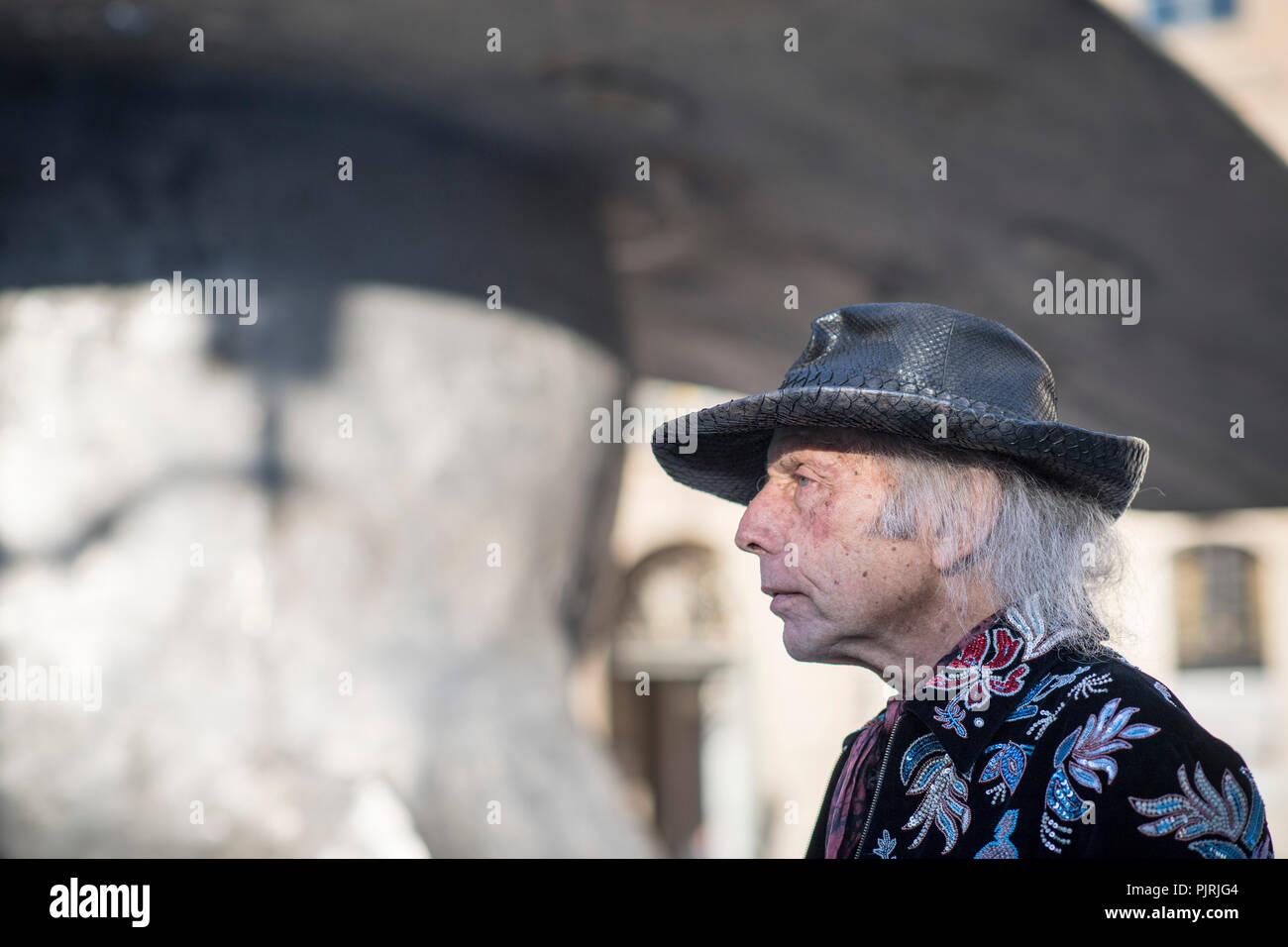 NBA Superfan James F. Goldstein pictured with the sculpture 'Pamela' of ...