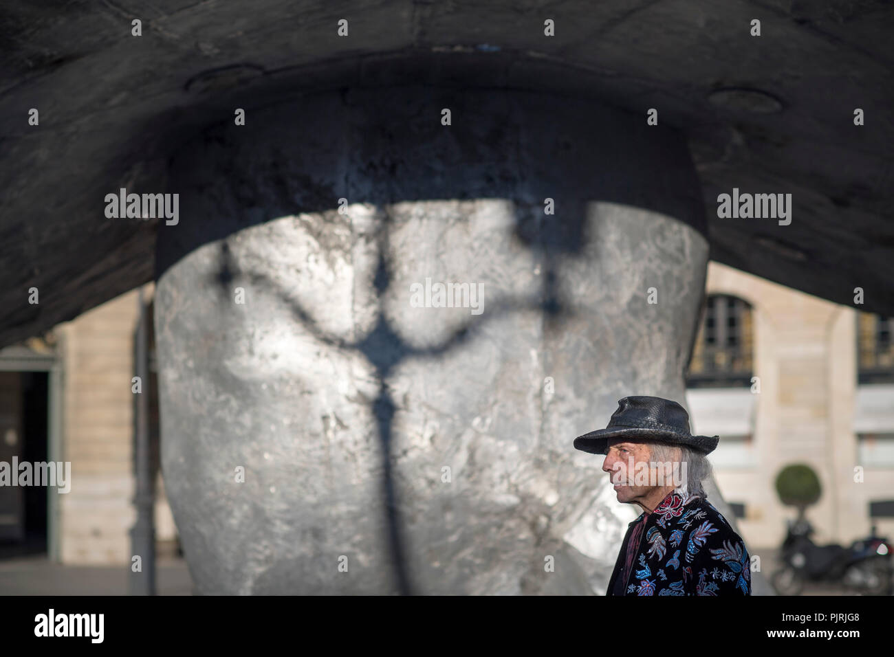 NBA Superfan James F. Goldstein pictured with the sculpture 'Pamela' of ...