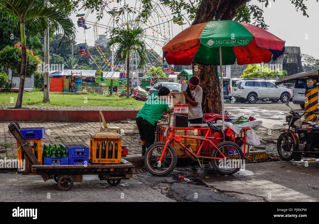 Manila, Philippines - Dec 21, 2015. Vendors on street in Manila ...