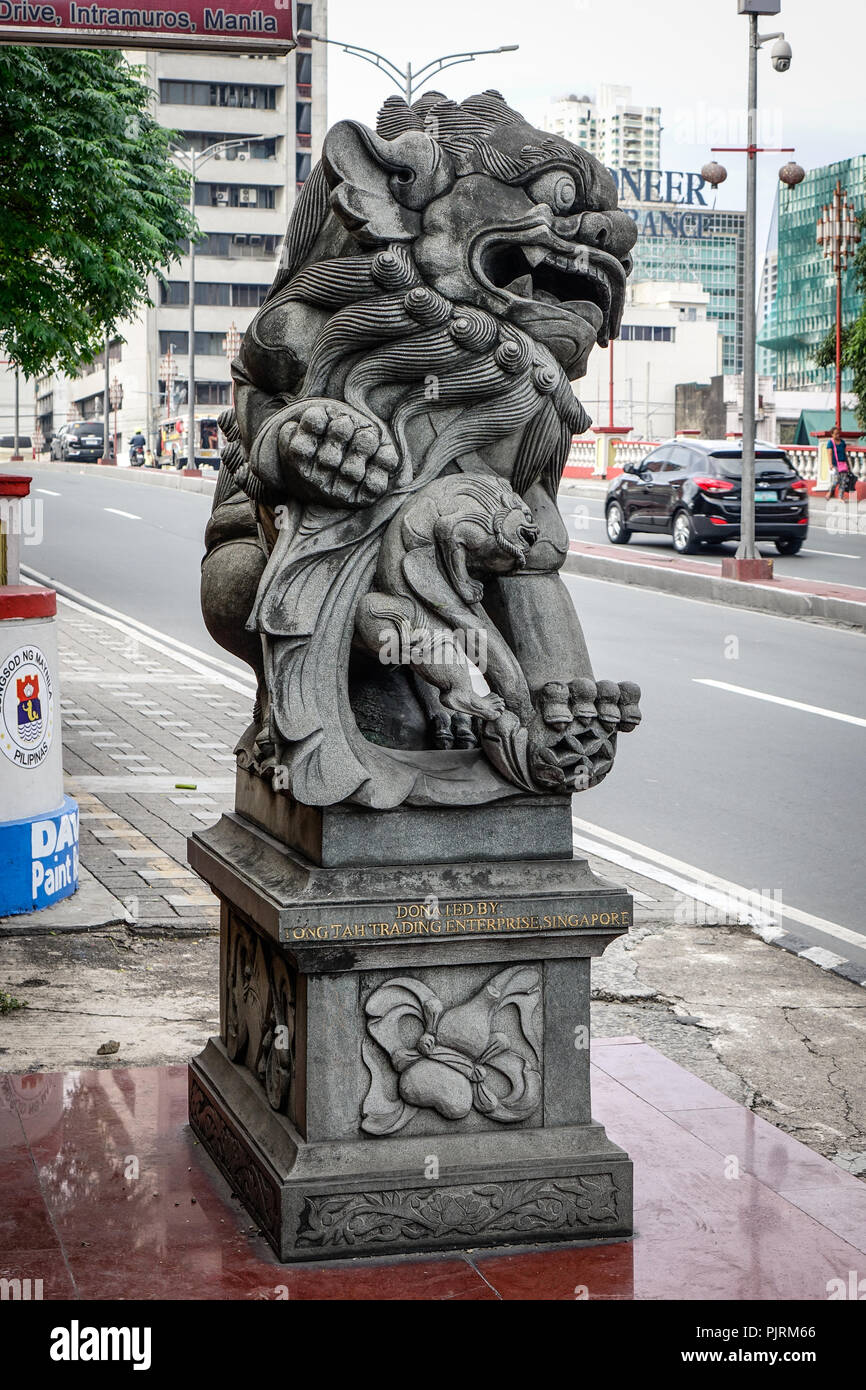 Manila, Philippines - Dec 21, 2015. A lion statue on street at ...