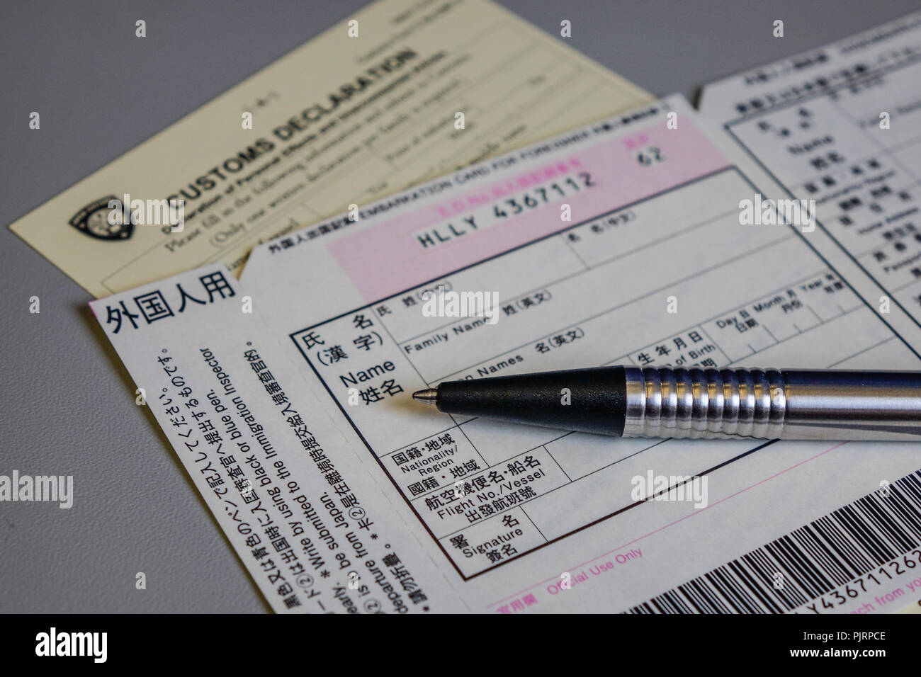 Nagoya, Japan - Dec 24, 2015. A pen with Japanese Immigration Card on ...