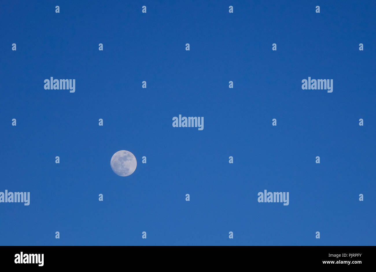 Crescent moon in the blue sky. Nature background Stock Photo - Alamy
