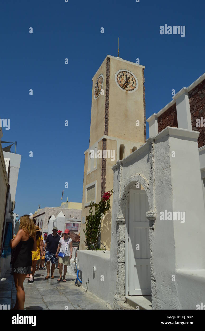 Upper Facade Of The Buildings Of The Beautiful Main Street Of Oia Where ...