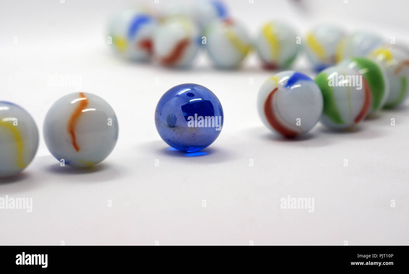 Red Marbles One Green Marble High Resolution Stock Photography and ...