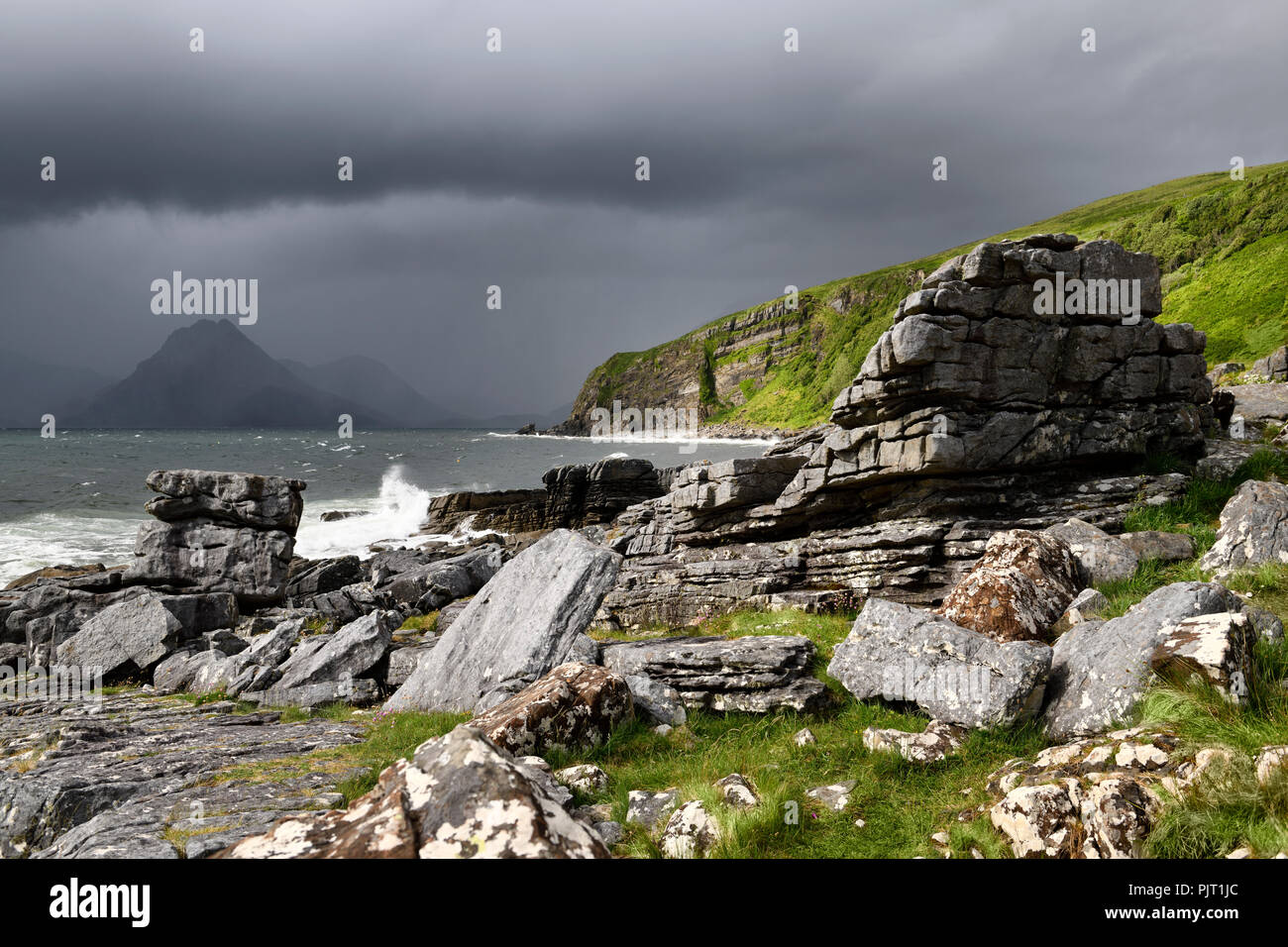 Cliffs and shore north of Elgol Port na Cullaidh with Red Cuillin ...