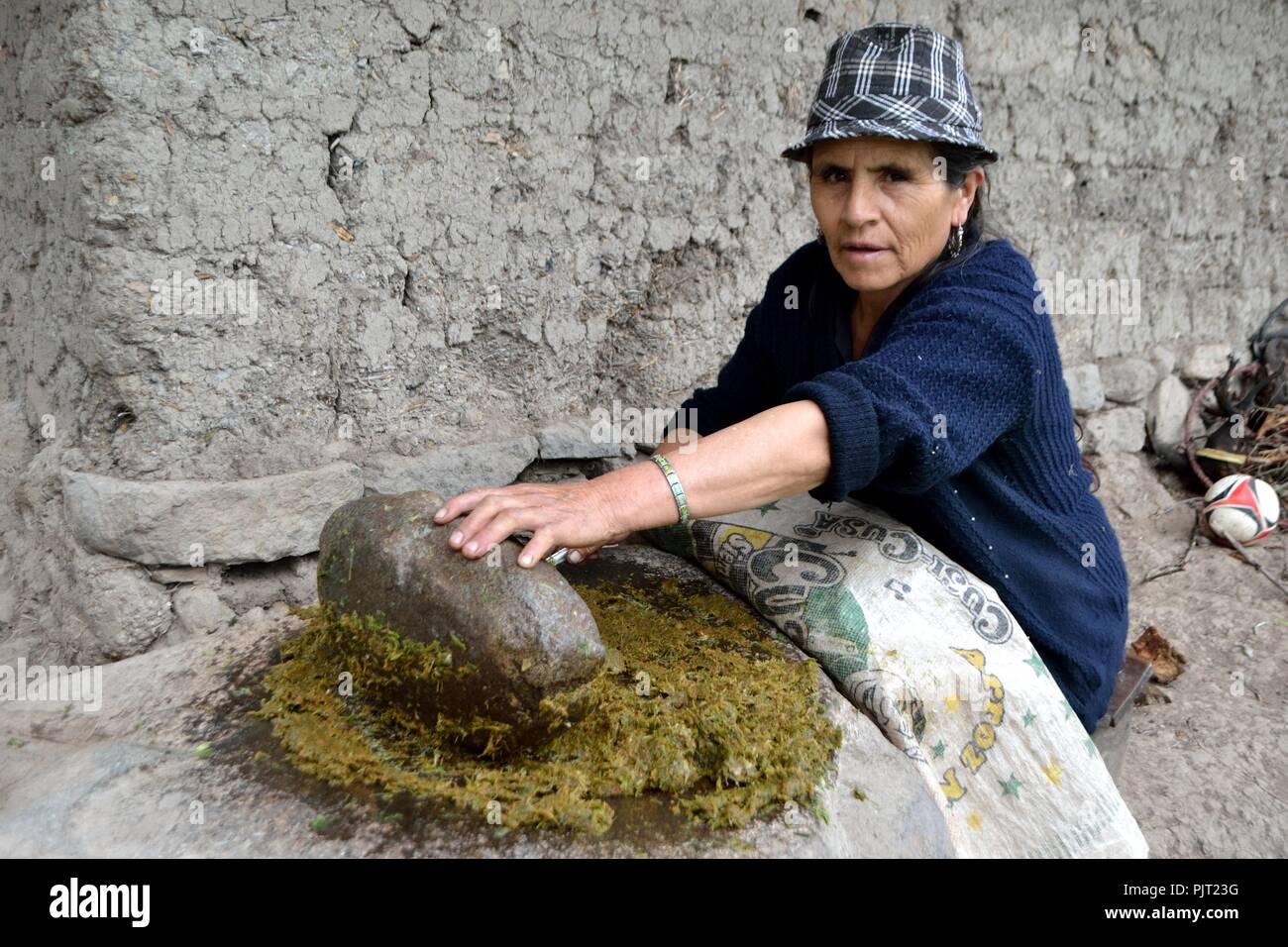 Grinding garlic on stone in SAN ANTONIO - Las Huaringas " - HUANCABAMBA ...