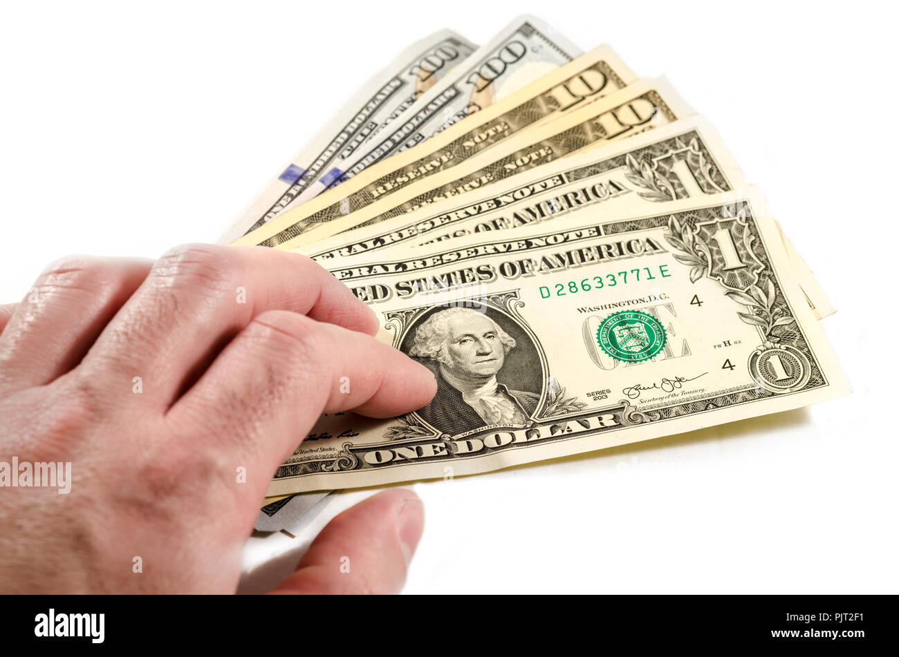 a human hand is taking dollars from the table. white background Stock ...
