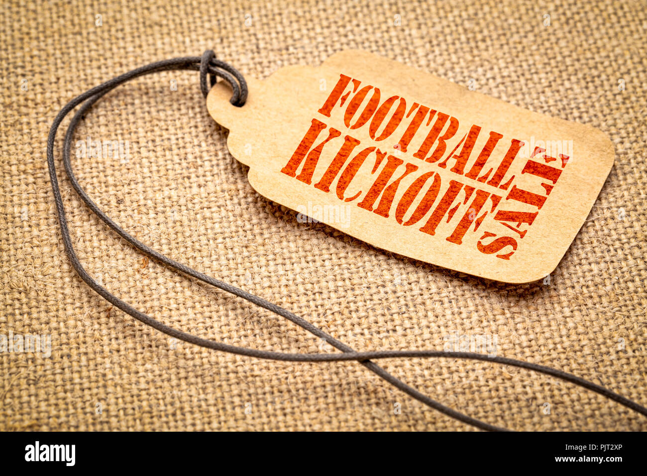 Football Kickoff Sale sign - a paper price tag with a twine iagainst ...