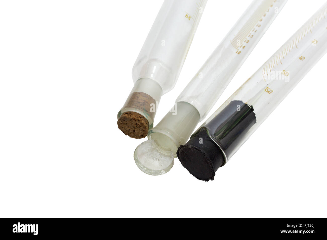 lab measuring tubes necks, closed by black rubber tapered plug, wooden ...