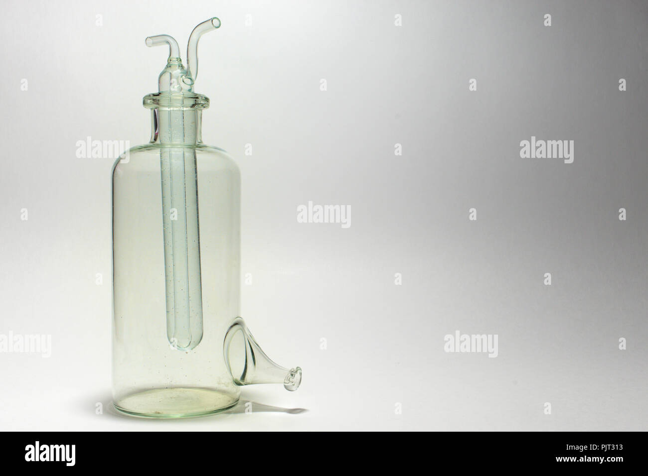 colorful laboratory bottle on monochrome backgrounds. lab glassware for ...