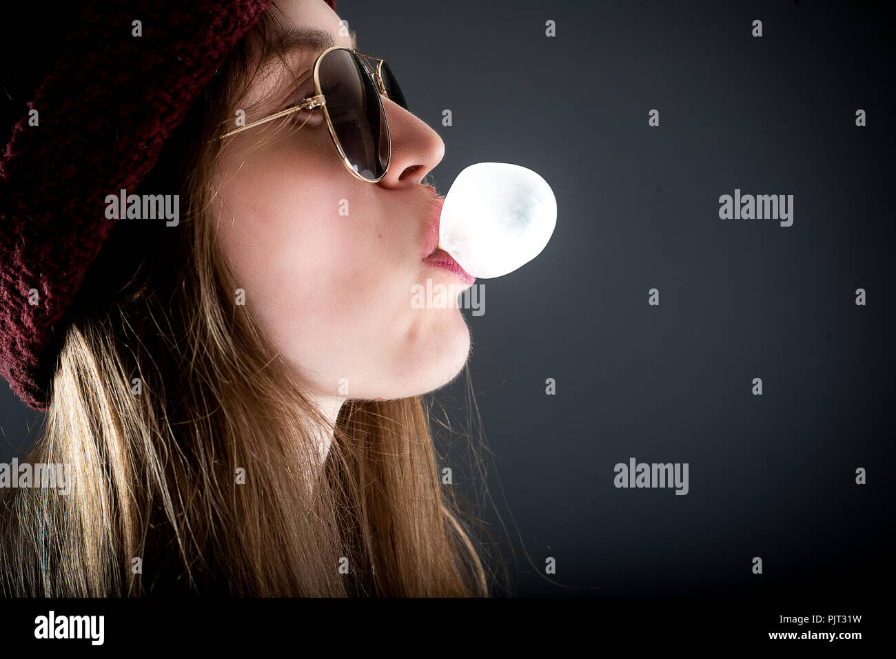 Woman chewing gum hi-res stock photography and images - Alamy