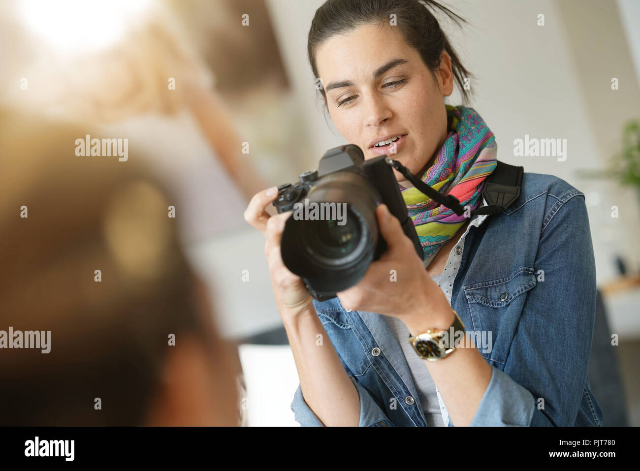 Portrait of woman photographer on a shooting day Stock Photo - Alamy