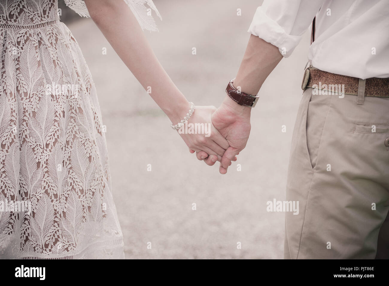 The bride and groom hand in marriage ceremonies as a symbol of love ...