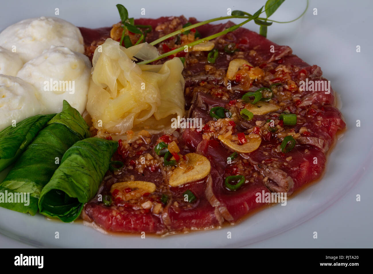 Raw Japanese young Beef carpaccio Stock Photo - Alamy