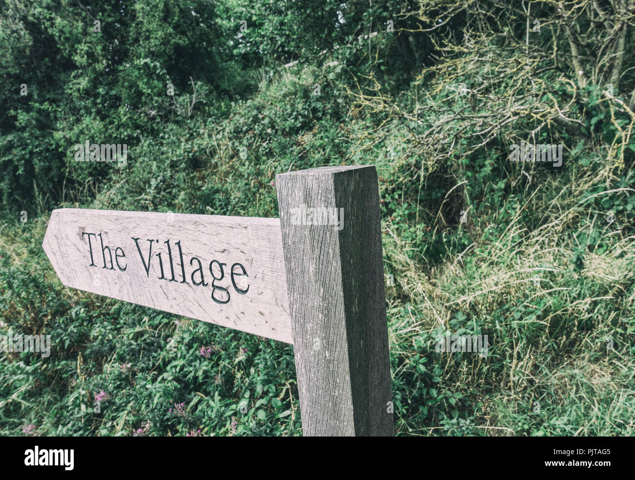 Village signpost from rural railway station Stock Photo - Alamy