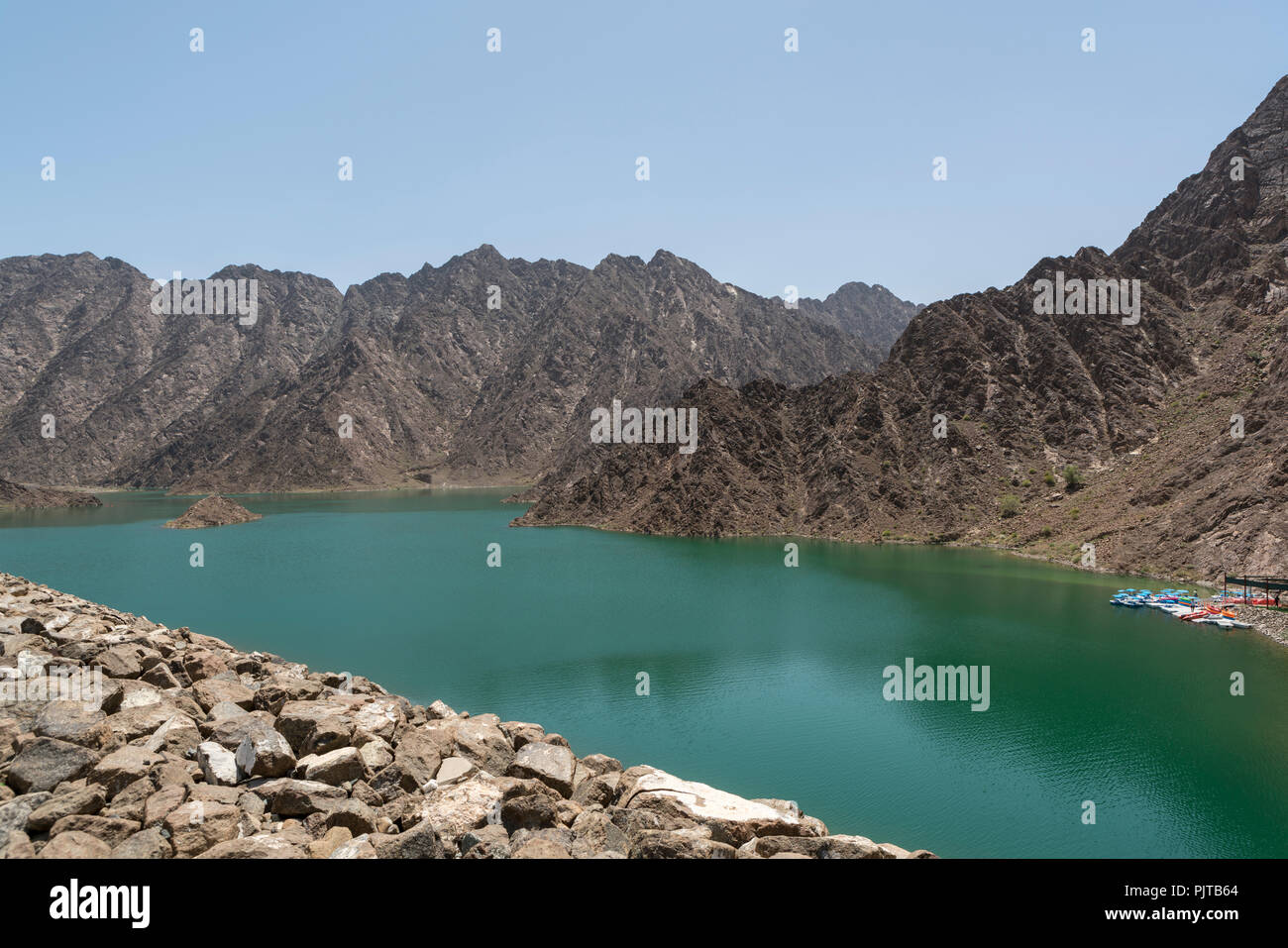 Hatta Dam and reservoir in Hatta, an enclave of the emirate of Dubai in ...