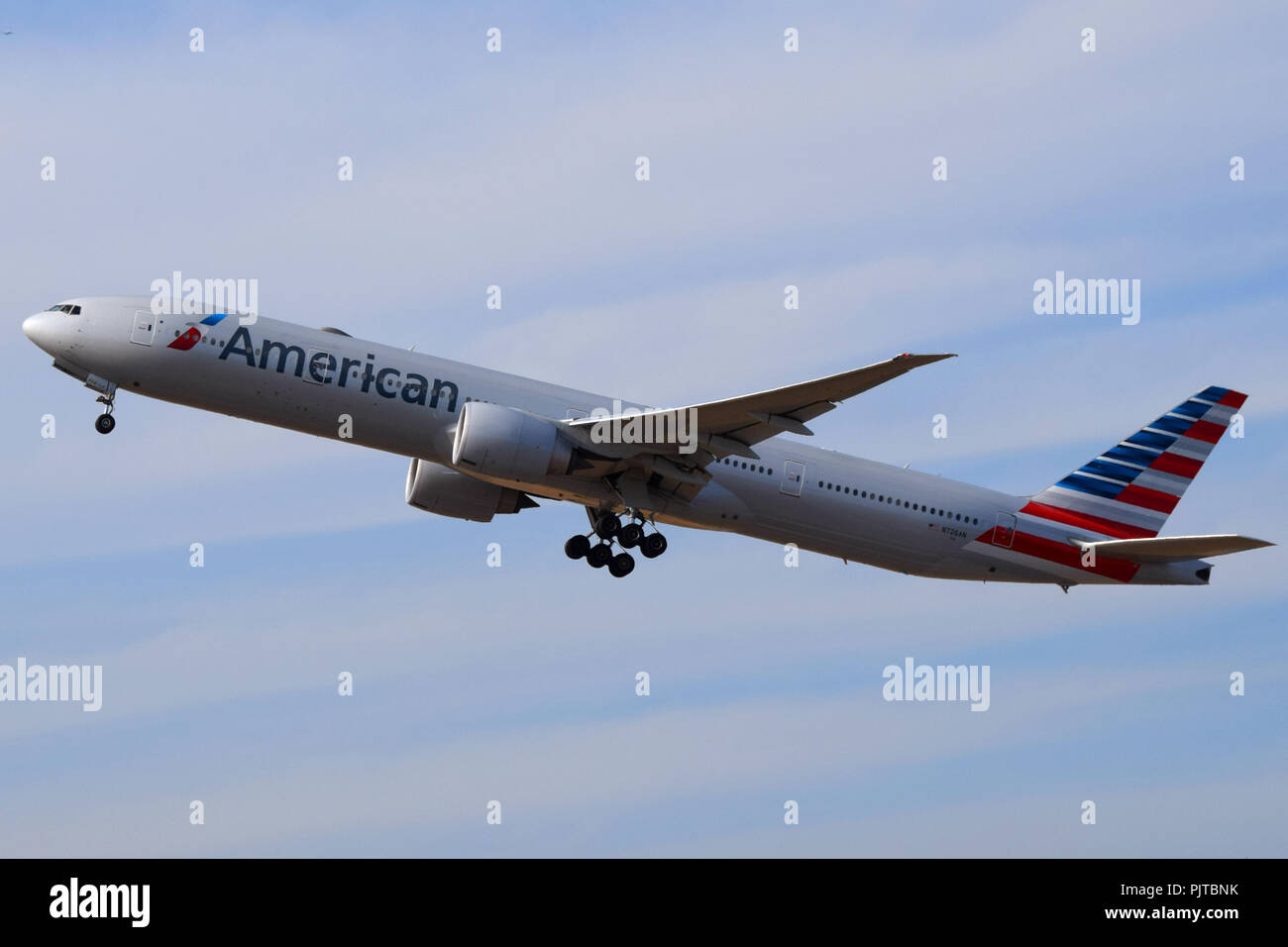 American Airlines Boeing 777-300er taking off from London Heathrow ...