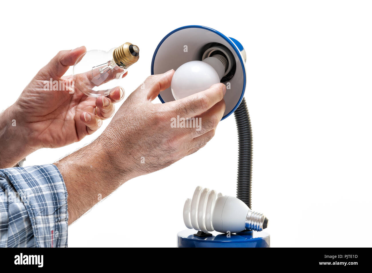 Electrician technician at work to replace the incandescent bulb of a ...