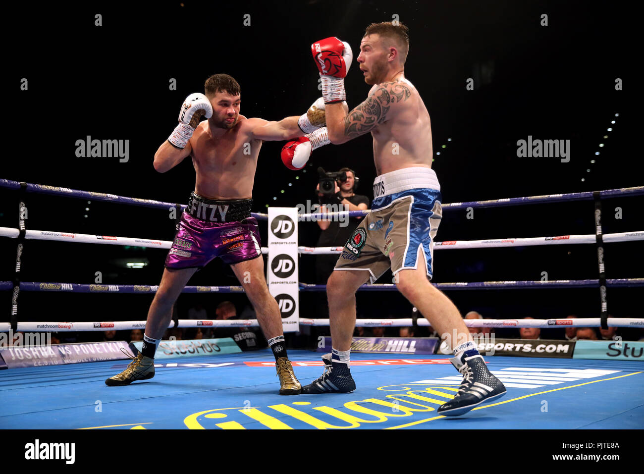 Scott Fitzgerald (left) in action against Craig Morris during their ...