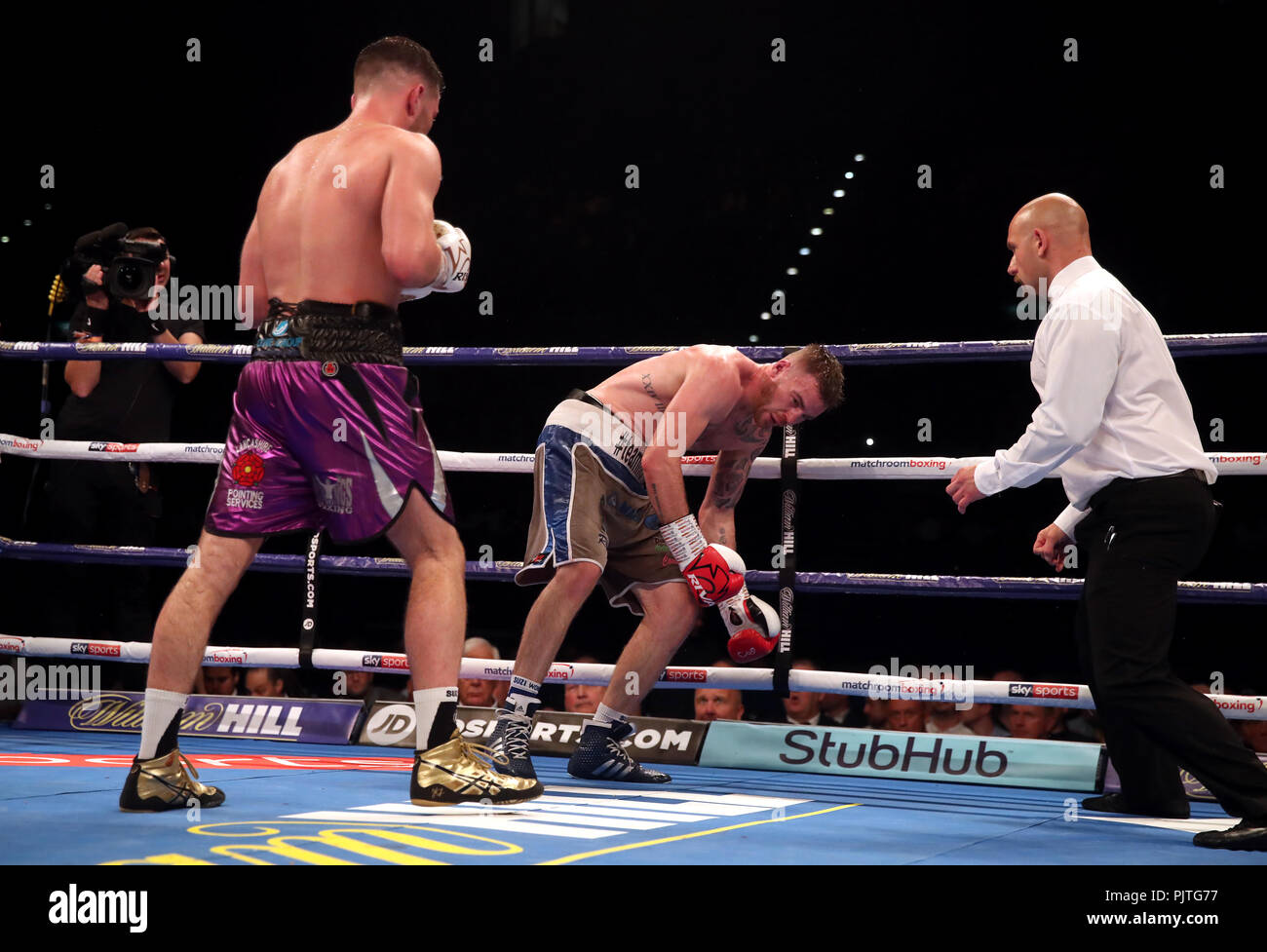 Scott Fitzgerald knocks down Craig Morris in the tenth round of their ...