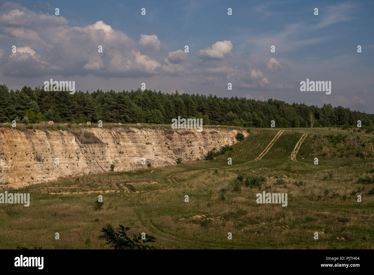 landscape with old and closed quarry of flintstone Stock Photo - Alamy