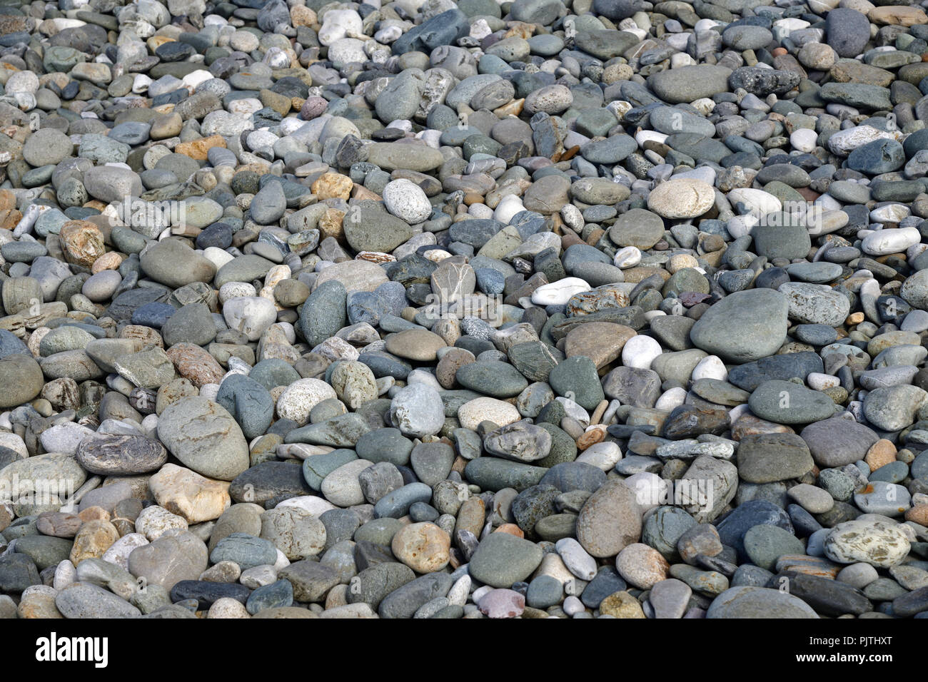 background of large pebbles on beach Stock Photo - Alamy