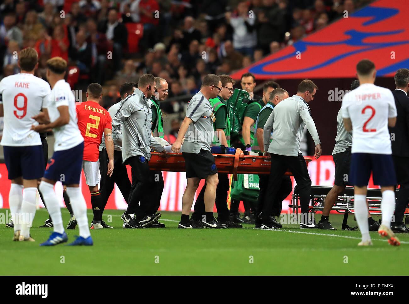 Stretcher on football pitch hi-res stock photography and images - Alamy