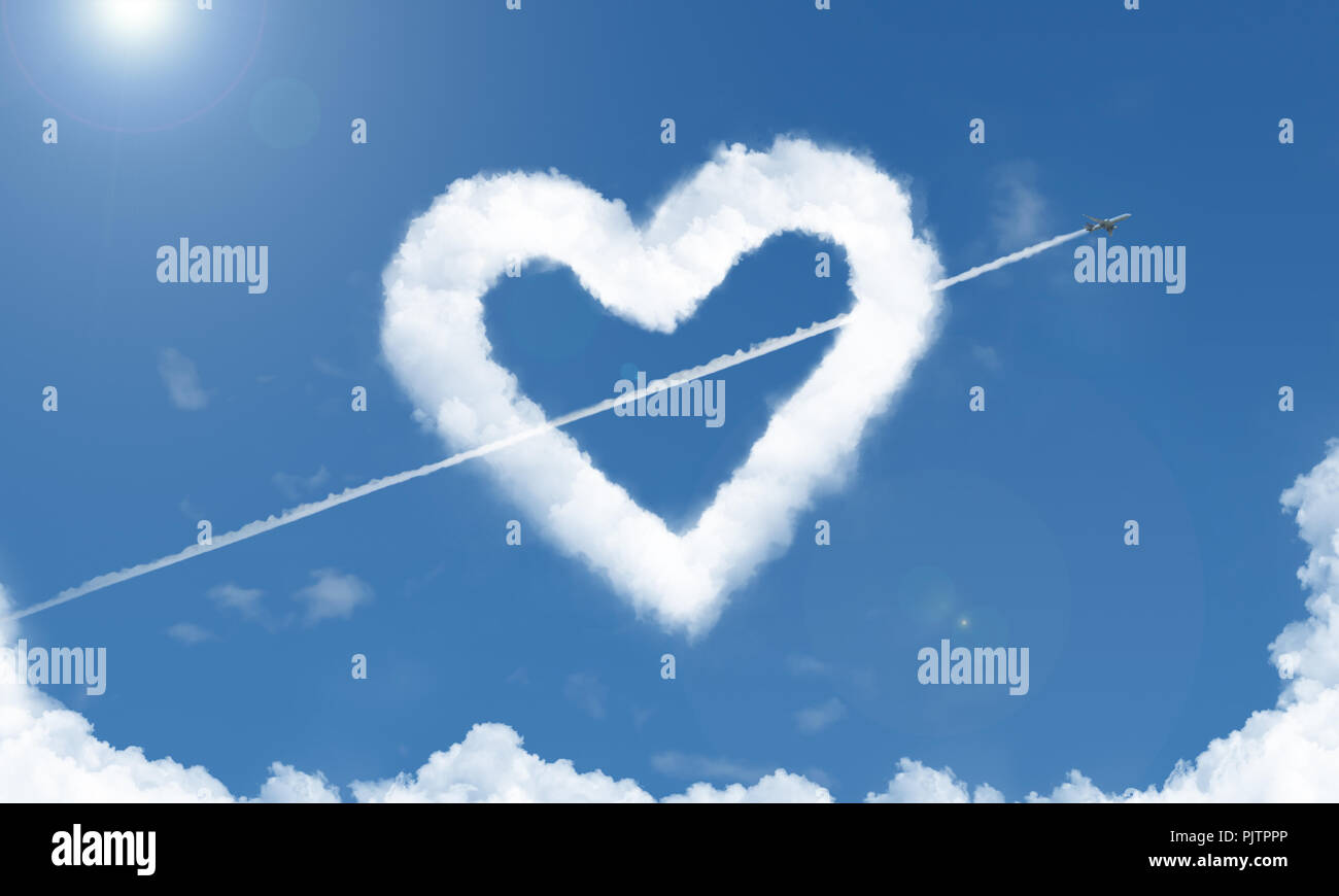 heart shaped cloud and airplane in the sky 3 Stock Photo - Alamy