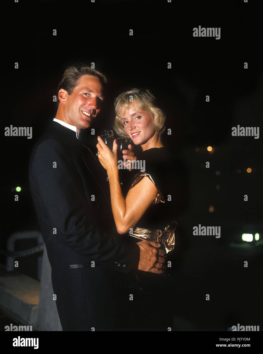 Drinking toast 1990s hi-res stock photography and images - Alamy