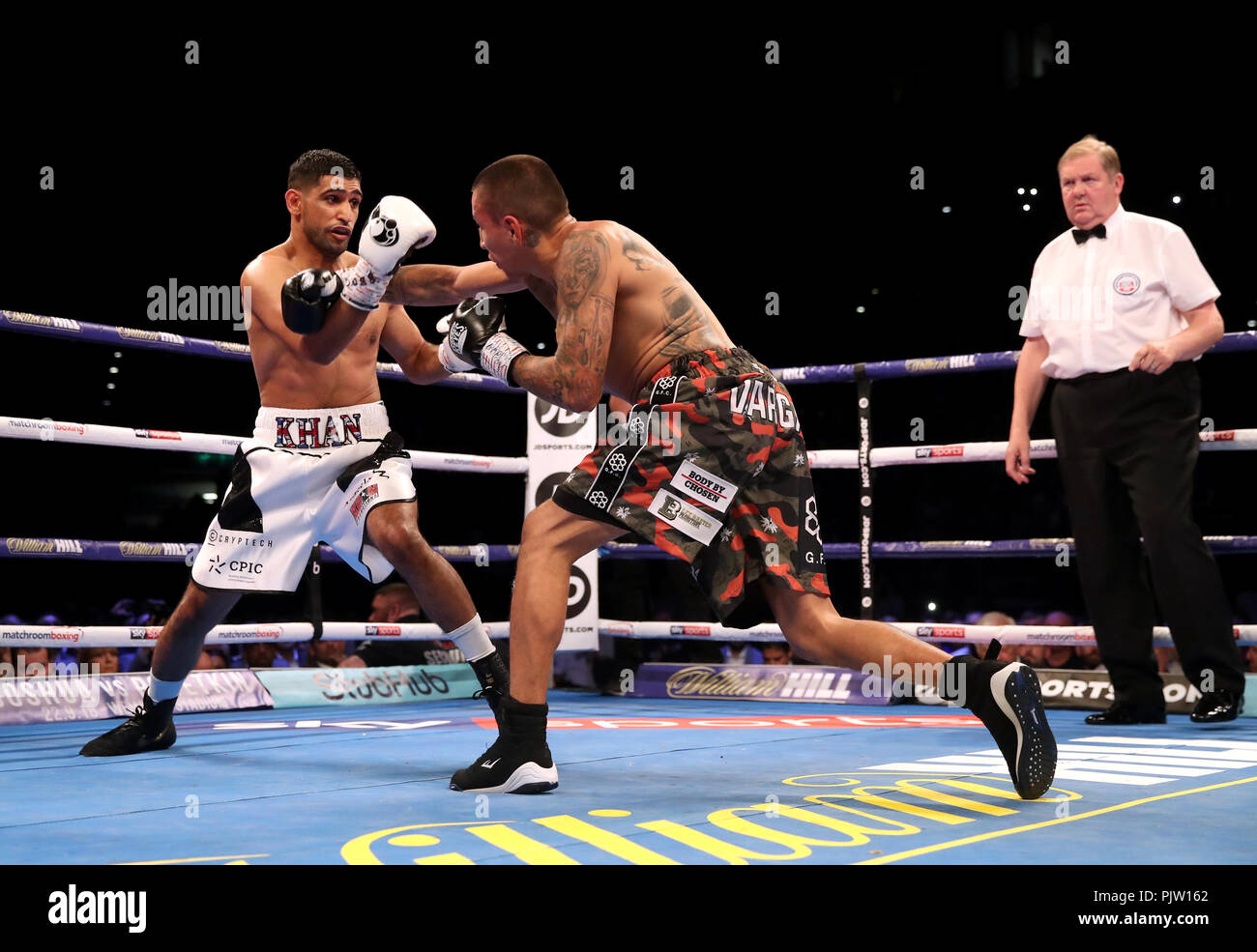 Amir Khan (left) and Samuel Vargas in action during their Welterweight ...