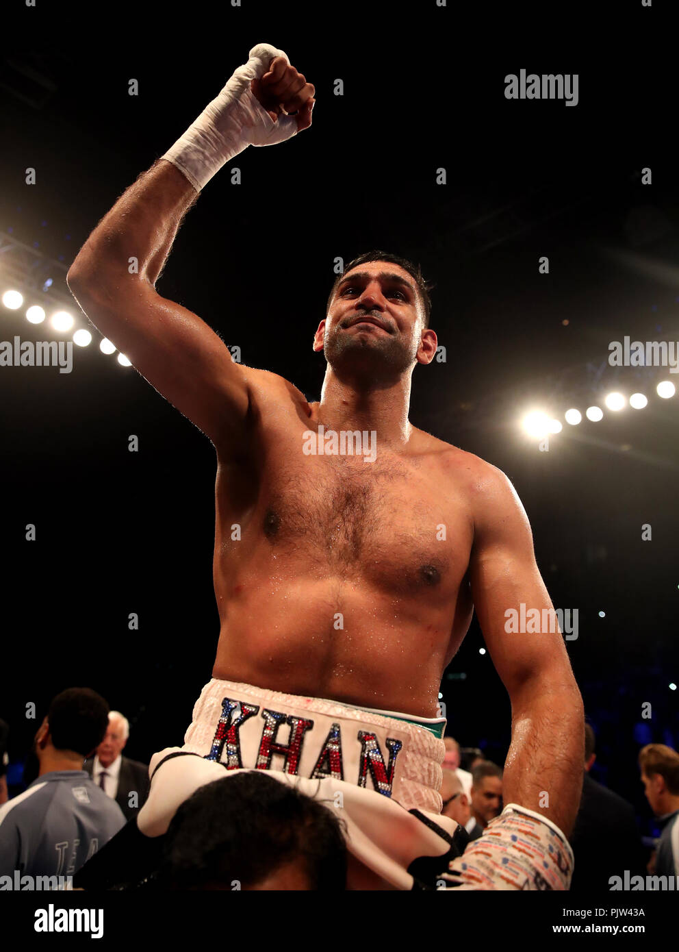 Amir Khan celebrates beating Samuel Vargas on points after their ...