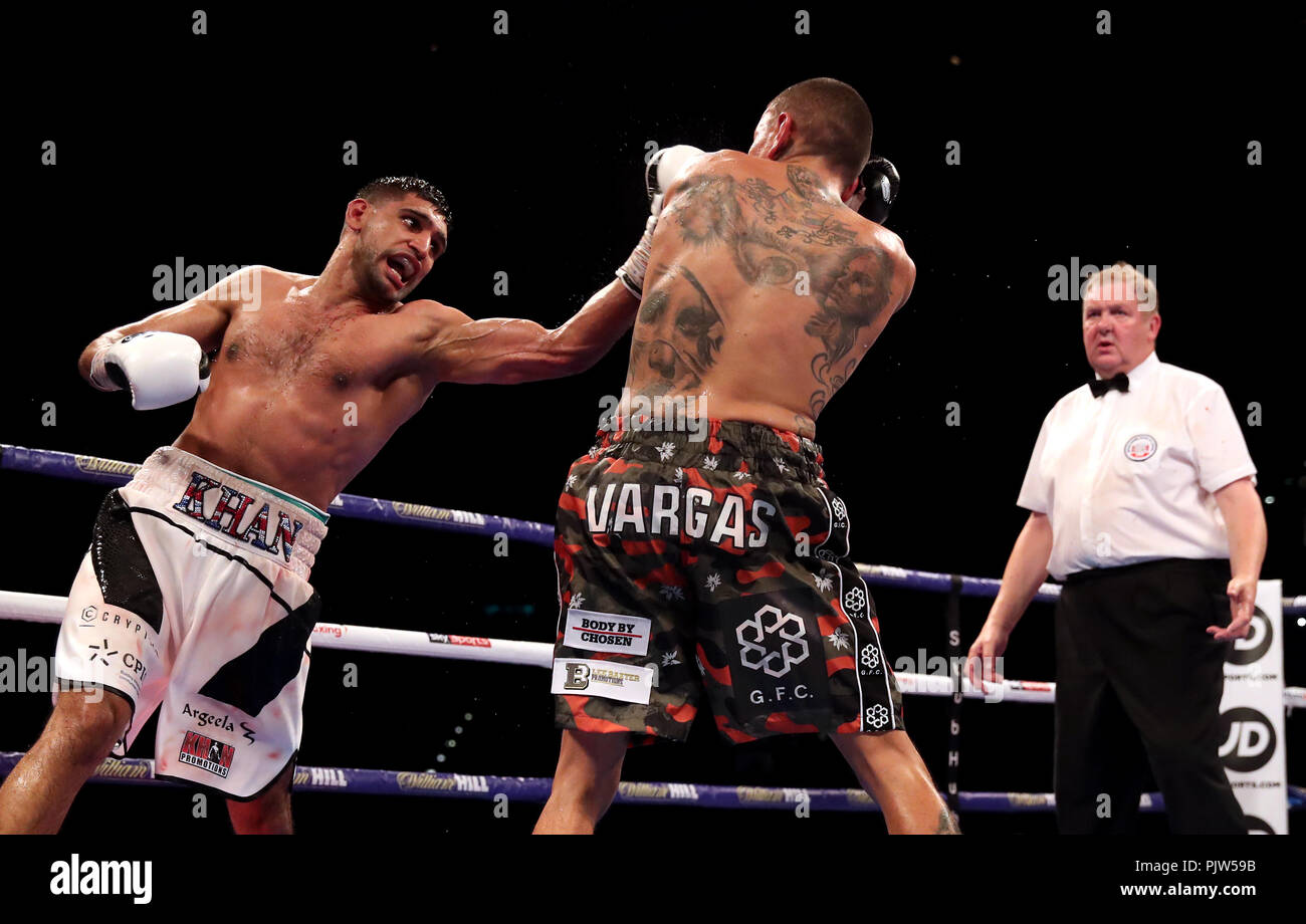 Amir Khan (left) and Samuel Vargas in action during their Welterweight ...