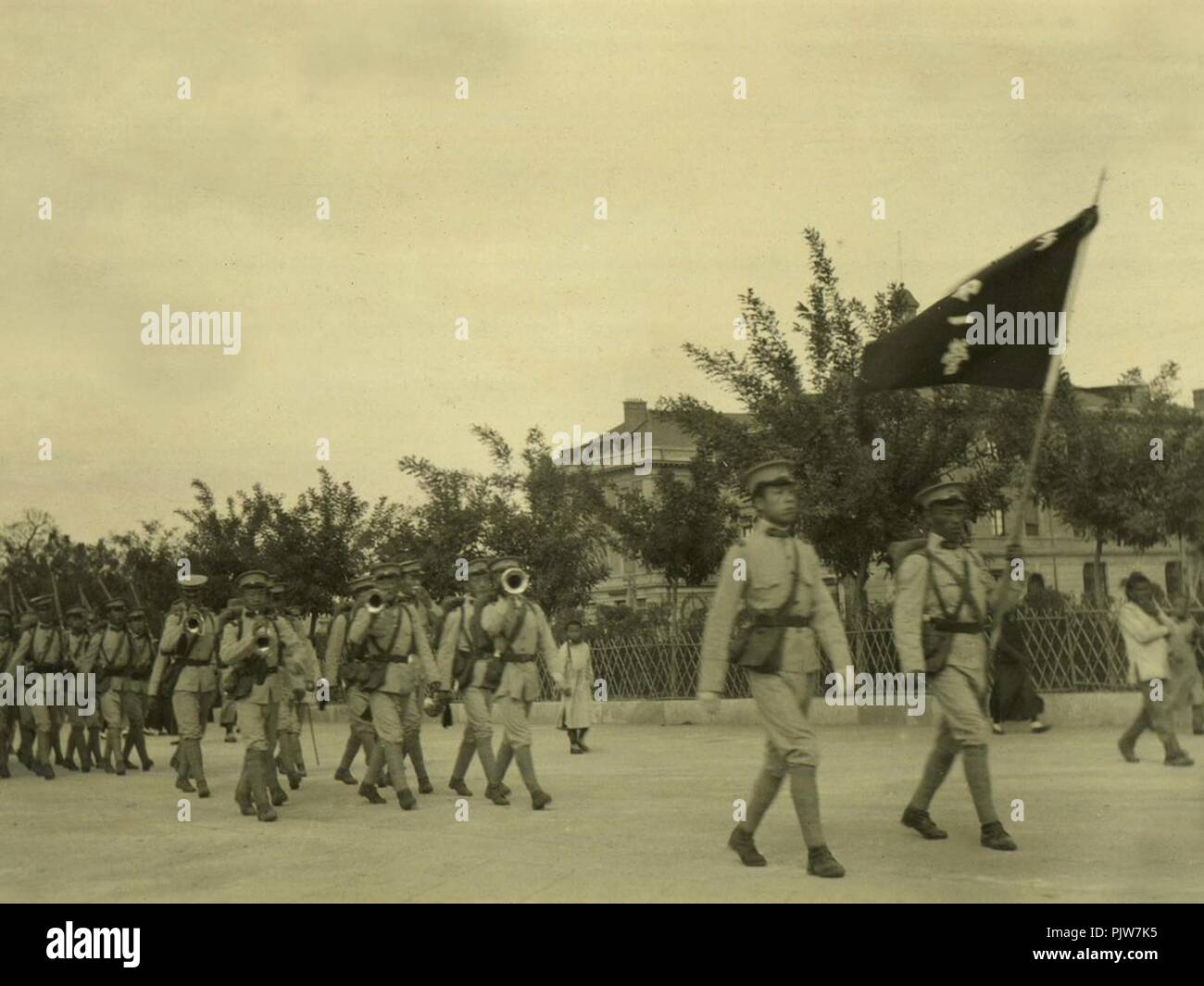Beiyang Army troops crossing the Gong An street Stock Photo - Alamy