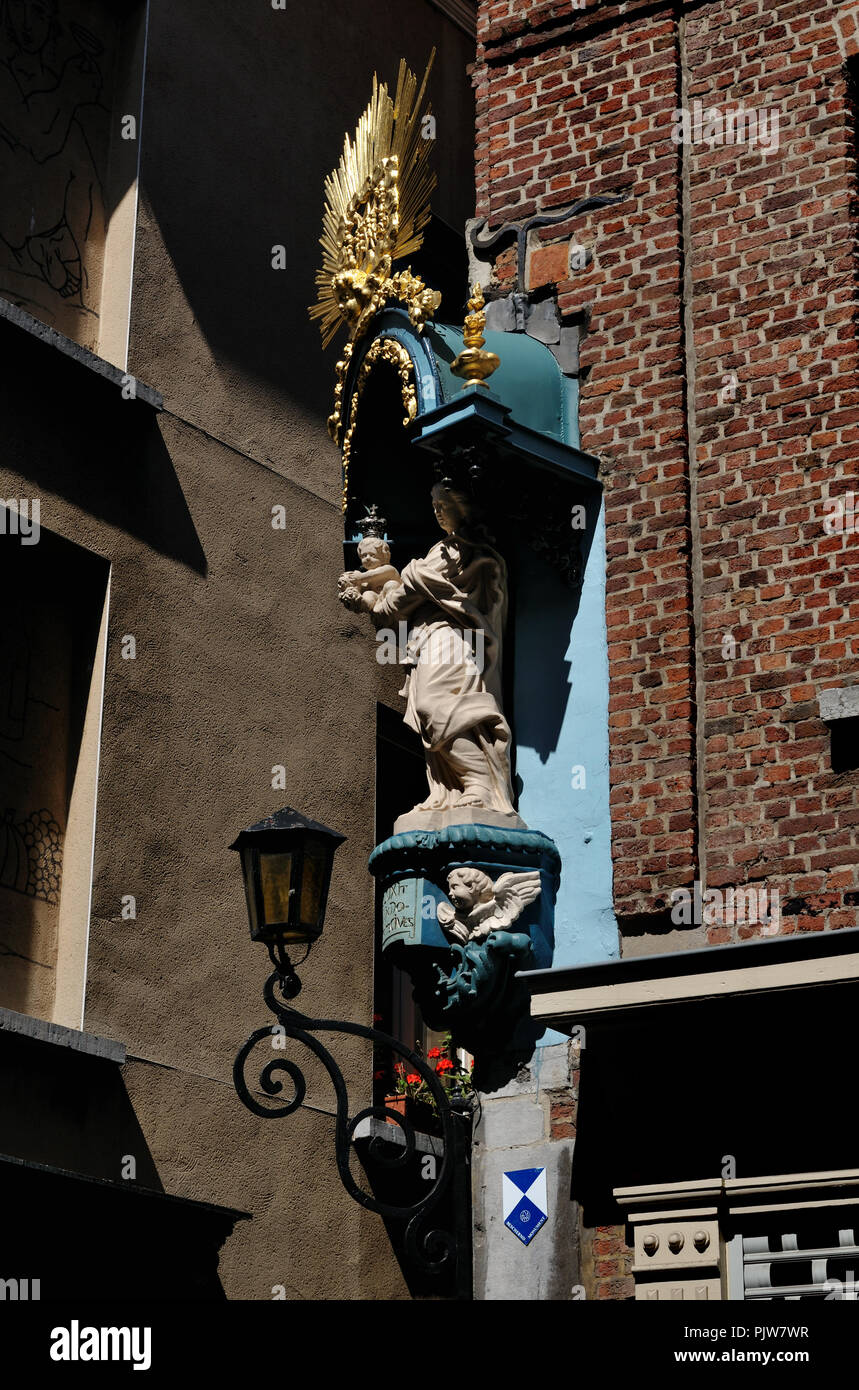 Typical Marie statues on the corners in the centr of Antwerp (Belgium ...