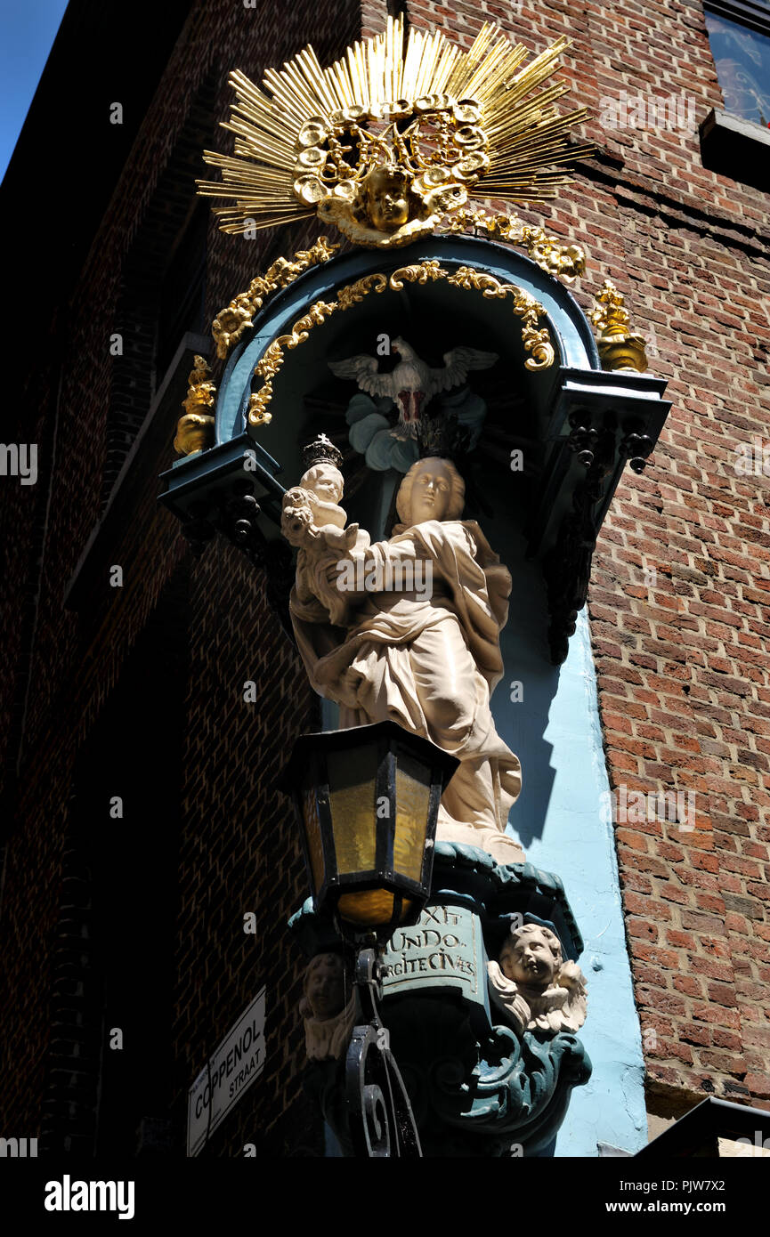 Typical Marie statues on the corners in the centr of Antwerp (Belgium ...